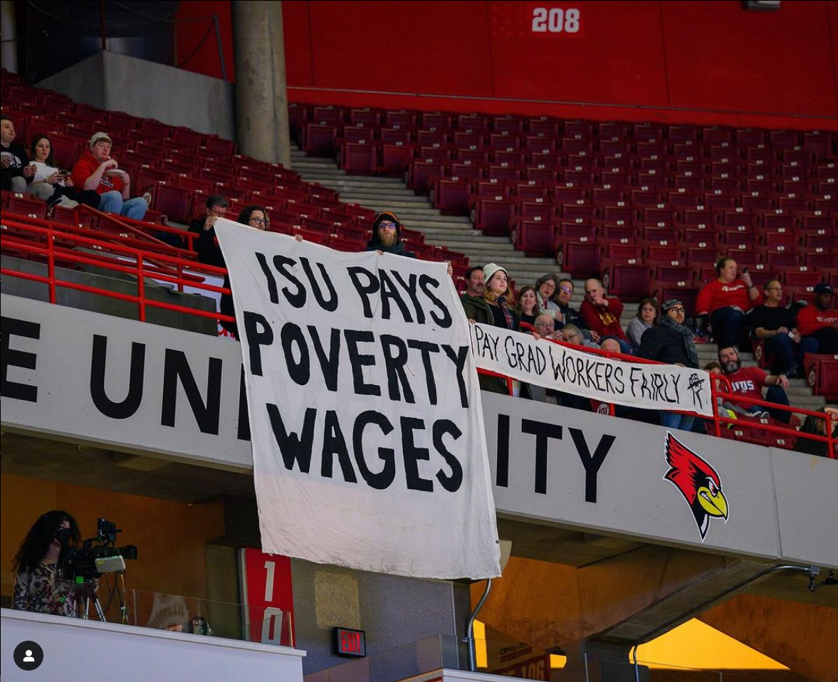 ISU Grad Workers Union drop banner at basketball game, continue ...